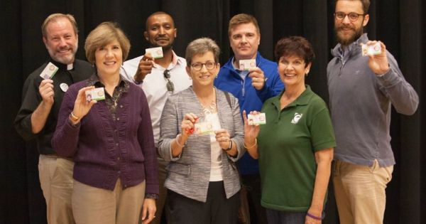 Community ID program builds trust between migrants and police ...