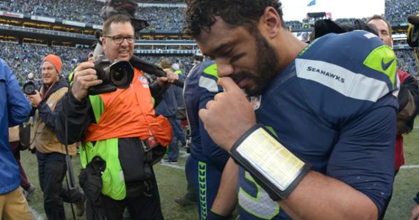 What's God got to do with football devotion? Plenty | National Catholic ...